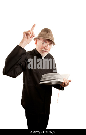 Senior priest or pastor giving a fiery sermon from the Bible Stock ...