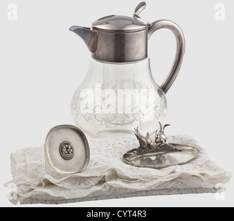 decorated bowl on the branches of a Christmas tree with bright colored ...