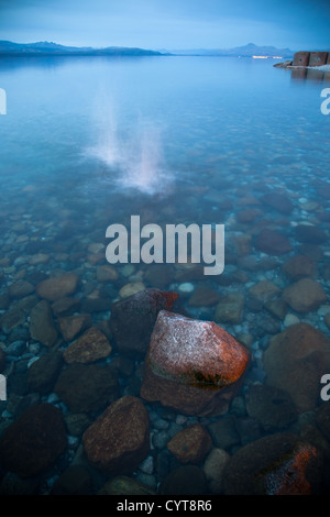 A wide shot of two rocks on Wied Babu river in the Blue Grotto, Zurrieq ...