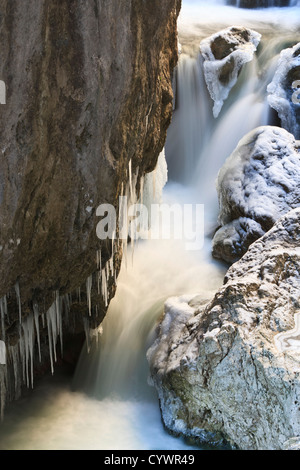 a small waterfall in winter Stock Photo - Alamy