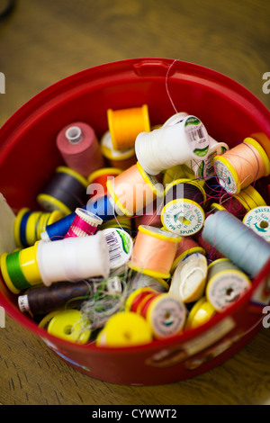 Cotton reels and coloured threads Stock Photo - Alamy