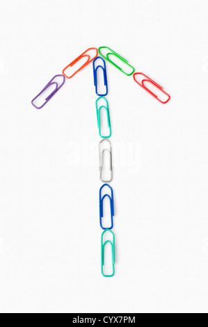 Paper clips arranged in an arrow shape Stock Photo - Alamy
