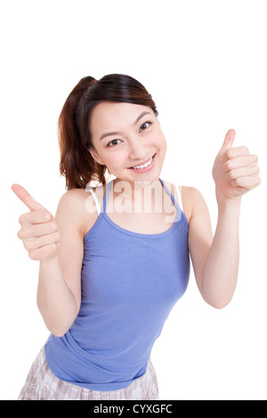 Joyful young woman doing thumbs up Stock Photo - Alamy