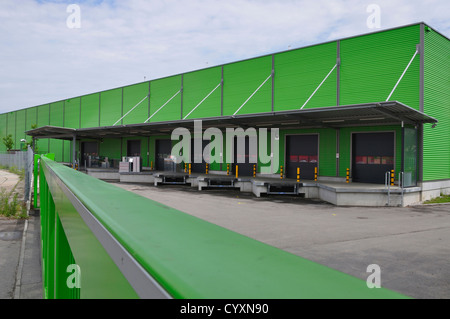 Germany, Bavaria, View of loading ramp at factory building Stock Photo ...