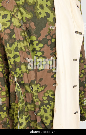 A reversible winter jacket of the Waffen SS, with spring camouflage ...