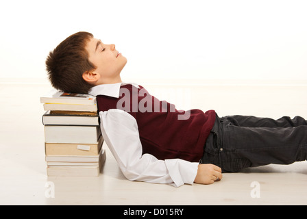 Boy lying on floor with stack of toy blocks at home Stock Photo - Alamy