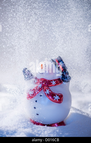 snowing, smiling snowman in winter Stock Photo - Alamy