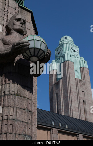 The statues of the train station in Helsinki against the blue sky Stock ...