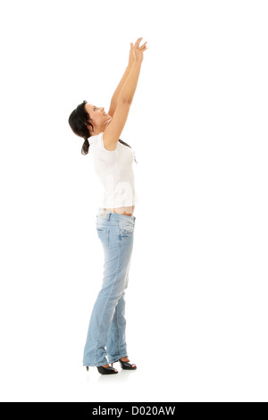 Woman trying to reach something with her hand Stock Photo - Alamy