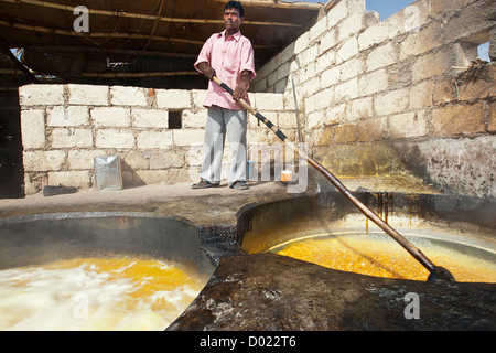 indian jaggery production - Making jaggery from sugar cane juice Stock ...