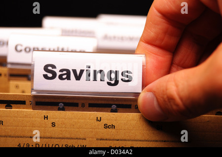 savings word on business folder showing saving money concept Stock ...
