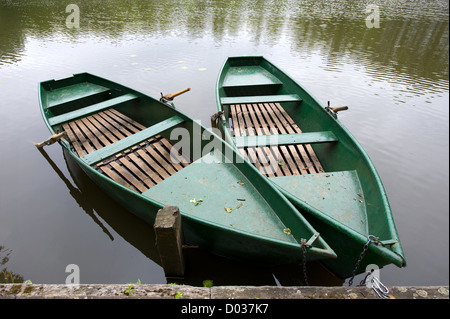 Empty rowboat in water Stock Photo: 11379416 - Alamy