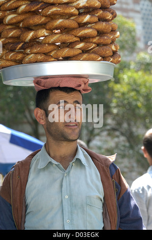 Turkish man carrying simit on the tray on his head - Turkish sesame ...