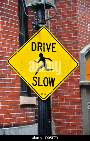 Residential street sign, drive slow Stock Photo - Alamy