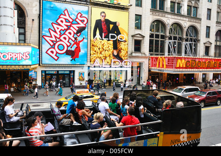 Tour Bus, tourists and Broadway Show Marquees, 42nd Street, NYC Stock ...