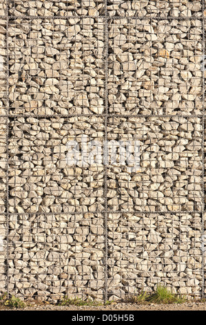 Caged rock riprap in stainless steel frames used as a structural Stock ...