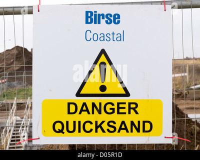 Danger quicksand warning sign Stock Photo - Alamy