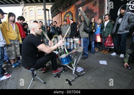 Street busker in Camden, London, England, UK Stock Photo - Alamy