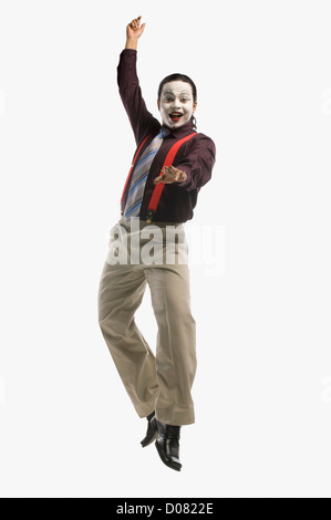 Mime falling isolated over a white background Stock Photo - Alamy