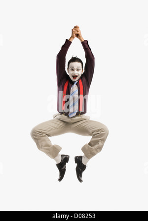 Mime falling isolated over a white background Stock Photo - Alamy