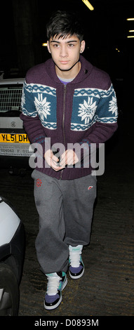 Zain Malik of One Direction arriving at Heathrow airport on a flight ...