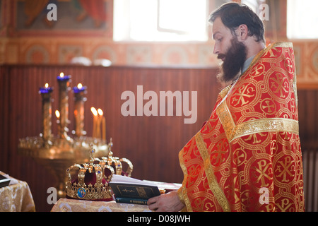 Orthodox priest during consecration in a church Stock Photo - Alamy