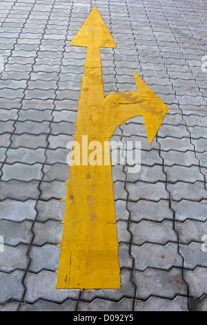 Arrows indicate the direction to be followed by vehicles Stock Photo ...