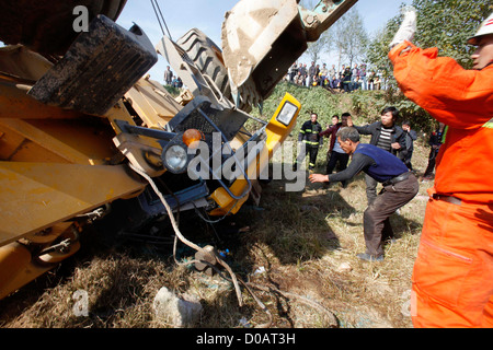 HUGE EXCAVATOR FLIPS LANDS ON LADY A brave woman had to dig deep to ...