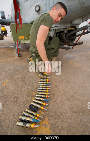 A US Marine Corps Weapons Technician Shows Off 20mm High Explosive ...