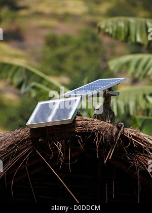 solar panel on thatched hut Stock Photo - Alamy