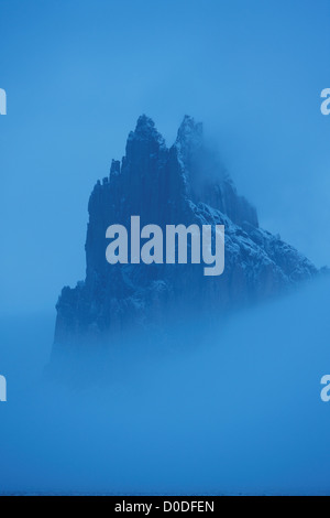 Winter fog shrouds Shiprock, also called Ship Rock, an ancient volcanic ...