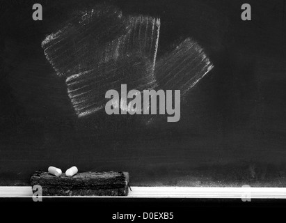 Chalkboard with chalk eraser marks in white chalk Stock Photo - Alamy