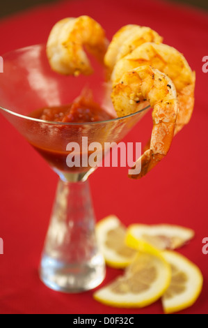 shrimp with cocktail sauce and lemon twirl Stock Photo - Alamy