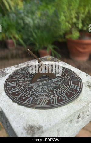 Garden sundial on stone plinth, England, UK Stock Photo - Alamy