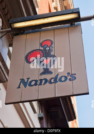 Nando's Peri Peri Chicken restaurant sign with funny caption "man ...