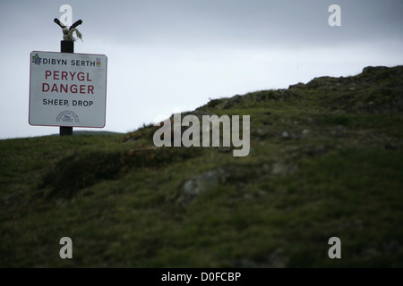 Sheer Drop warning sign changed to "Sheep Drop" on the summit of Conwy ...