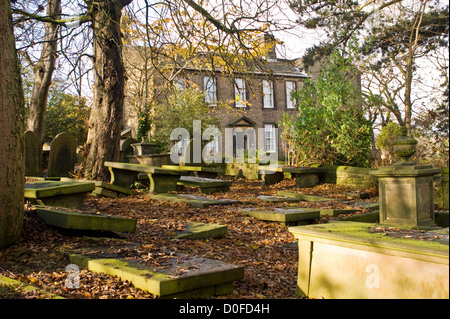 Haworth Cemetery with the Bronte Parsonage in the background Stock ...