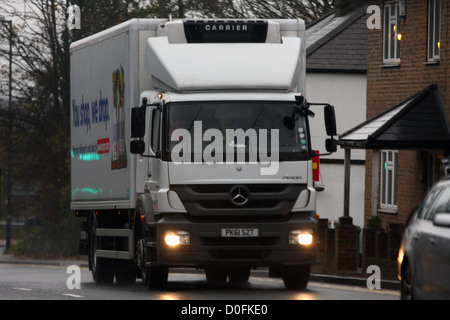 Side view of a Tesco supermarket hgv food supply chain juggernaut lorry ...