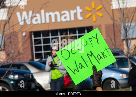 Demonstrators protest against working conditions at Walmart Stock Photo ...