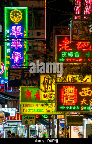Hong Kong neon light signs with bamboo scaffolding Stock Photo - Alamy