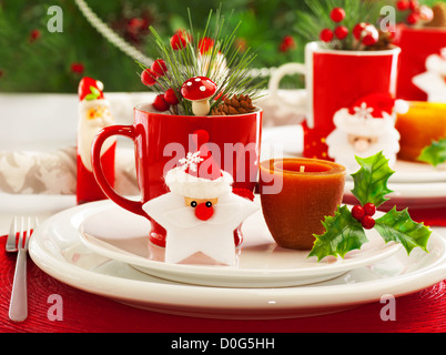 Beautiful holiday table setting in white and gold color Stock Photo - Alamy