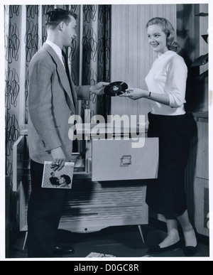 Vintage music record player with a vinyl record Stock Photo - Alamy