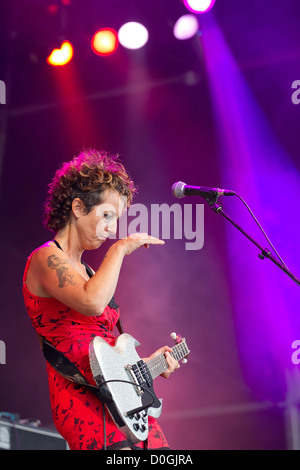 Betty (Elizabeth Ziff, Alyson Palmer, Amy Ziff) performs on stage ...