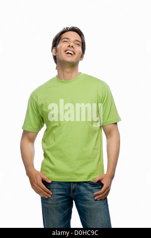 Vertical shot of a laughing male model with sunglasses on the ...