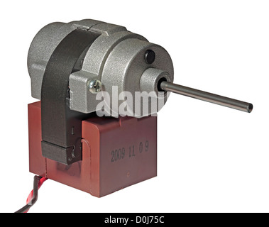 Direct current electric motor with white gear attached to it shaft on a ...