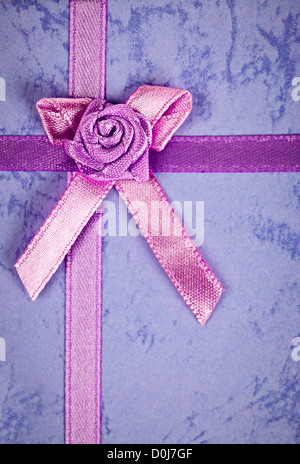 Present boxes with tied ribbon on wrapping paper celebrations concept ...