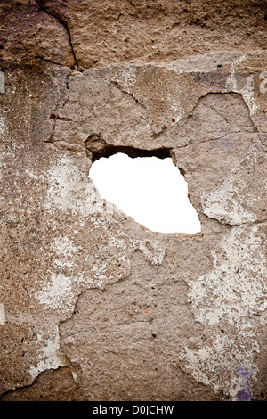 Hole In Damaged Concrete Wall By A Rocket Hit Stock Photo - Alamy