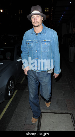 Kid Rock wearing a denim jacket and jeans, out and about smoking his ...