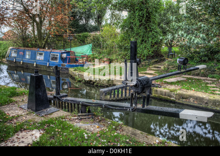Lock gates on the river Nene near the Northampton boat club on a dull ...
