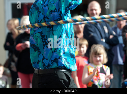 Man doing hula hoop show Stock Photo - Alamy